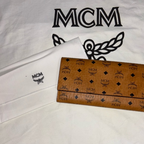 MCM | Bags | Mcm Cognac Wallet With Black Logo | Poshmark
